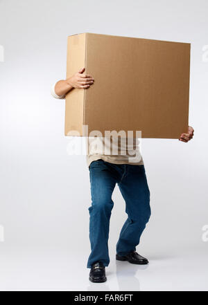 stock image of the man carrying paper box Stock Photo - Alamy