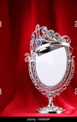 Tiara on top of a mirror Stock Photo - Alamy