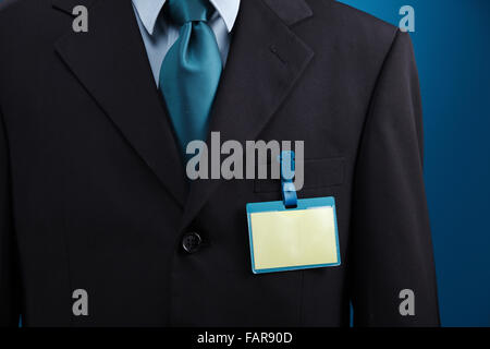 Person with name tag on chest Stock Photo - Alamy