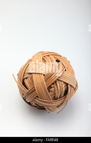 Sepak Takraw (kick volleyball) ball on plain background with soccer ...