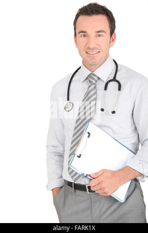 A male surgeon wearing dark grey scrubs and sterile white latex gloves ...