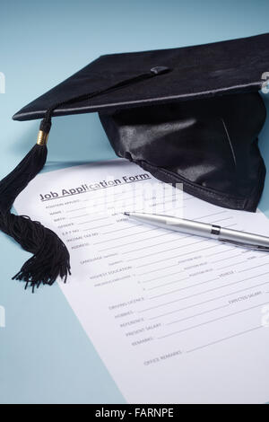 Graduation hat with application form Stock Photo - Alamy