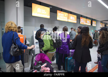 Christmas holiday makers check in at the easyJet bag drop facilities ...