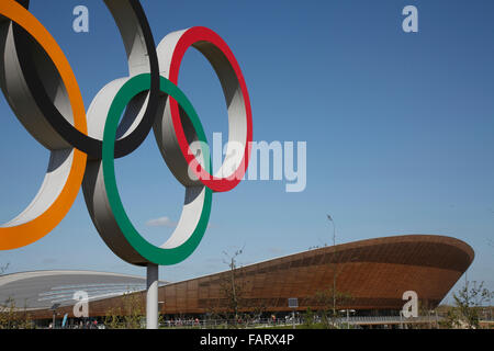 Olympic rings with velodrome beyond Stock Photo - Alamy