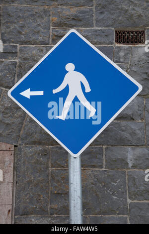 Blue sign on a stone wall at the bridge Pont De Bir Hakeim entrance ...