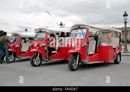 Tourist in Paris and auto rickshaw or tuk-tuk Stock Photo - Alamy