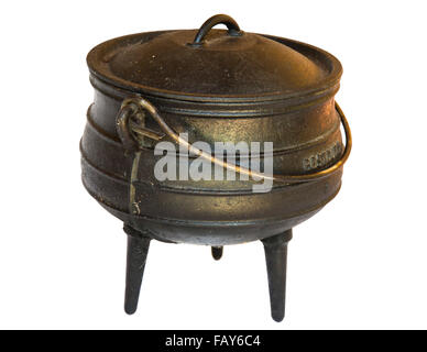 Three-legged black cast iron cooking pot Stock Photo - Alamy