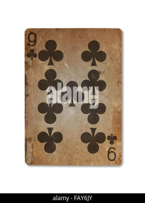 A vintage nine of clubs playing card isolated on a white background ...