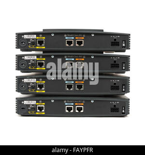 Stack of CISCO 800-series office routers Stock Photo - Alamy