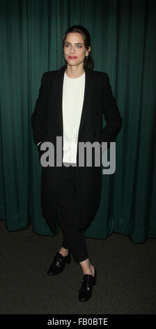 Author Andrea Troyer and actress Amanda Peet sign copies of their book ...