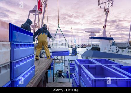 fishing boat fishermen unloading fish Malpe Beach Arabian sea Udupi ...