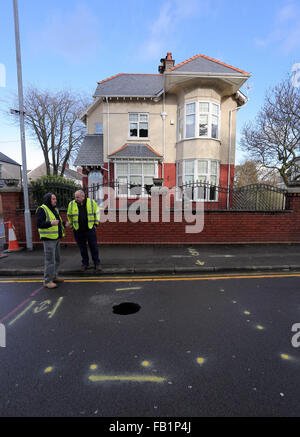 Neath, UK. Thursday 07 January 2016 The sinkhole in Cimla Road, Neath ...