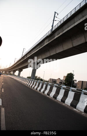 A flyover bridge or overpass. Below an overhead section of road ...