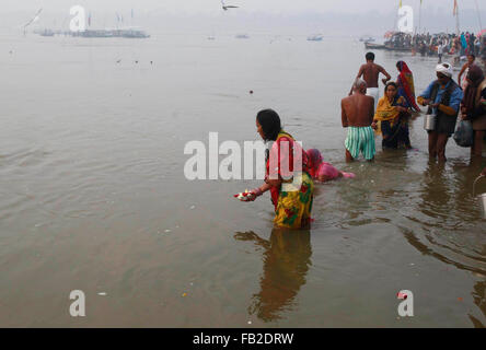 India. 08th Jan, 2016. Hindu devotee takes holy bath in the Sangam ...