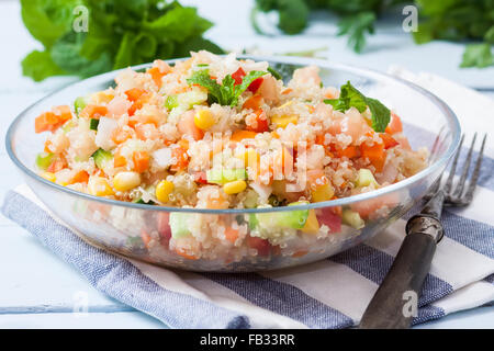 fresh quinoa salad taboule style with vegetables on bowl Stock Photo ...