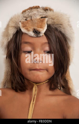 A Native American boy member of the Acjachemen tribe plays the clapper ...