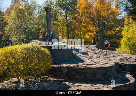 Opus 40 is an environmental sculpture in a bluestone quarry near ...