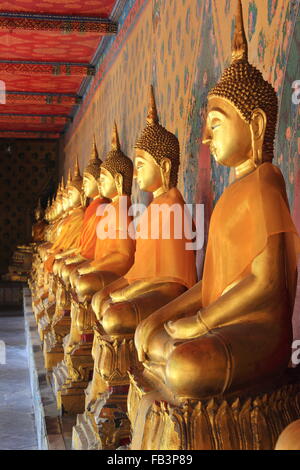 Golden Buddha statue is squat in four angle of the Thai church Stock ...