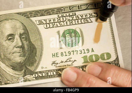 Counterfeit money testing pen Stock Photo - Alamy