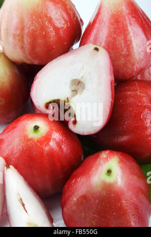The red Java apples on the plain background Stock Photo - Alamy
