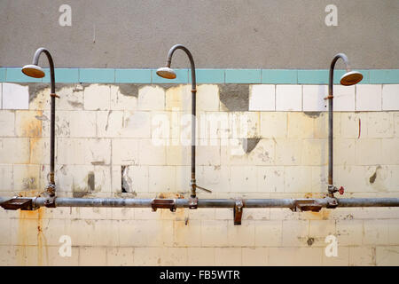 Communal miner's showers, Saint-Etienne Mine Museum, France Stock Photo ...