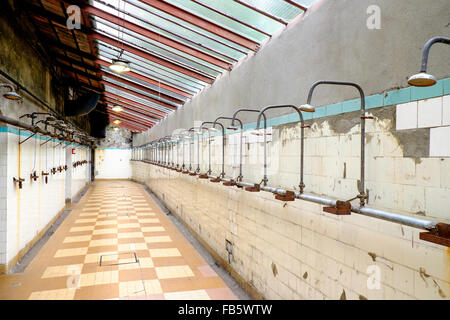 Communal miner's showers, Saint-Etienne Mine Museum, France Stock Photo ...