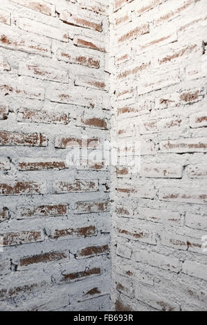 the corner of the room with white brick wall and floor, abstract ...