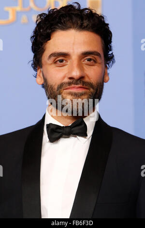 Oscar Isaac poses in the press room with the award for best performance ...