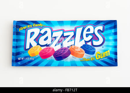 A packet of Razzles, a candy that once chewed, mixes to transform into ...