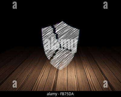 Privacy concept: Broken Shield in grunge dark room Stock Photo - Alamy