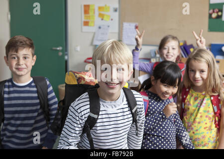 Students are in the classroom, they are having fun while listening to a ...