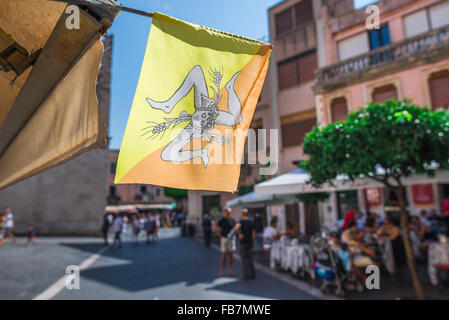 Sicily flag, view of a flag bearing the emblem of Sicily - the ...