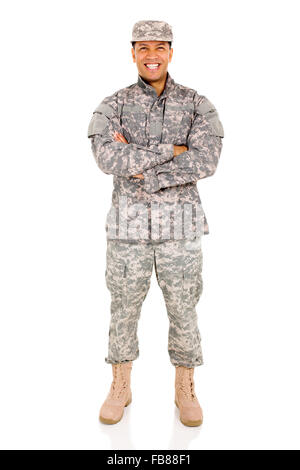 Portrait of military man standing with arms crossed during obstacle ...