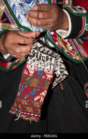 Peruvian woman working on traditional handmade wool production Stock ...