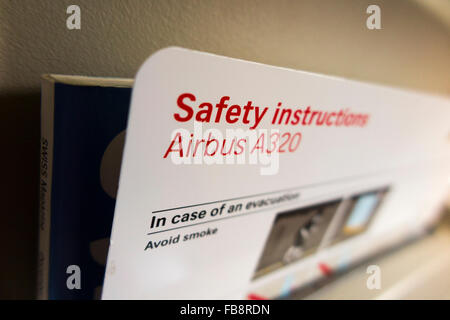 Passenger safety instructions of a plane Stock Photo - Alamy
