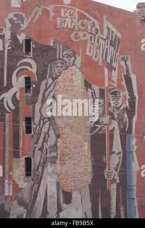 Communist era Russian language mural text on 'humane relations and ...