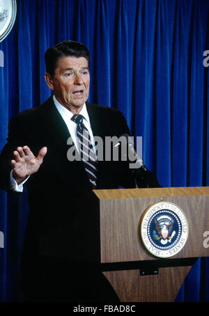 President Ronald Reagan answers a question during an exclusive ...