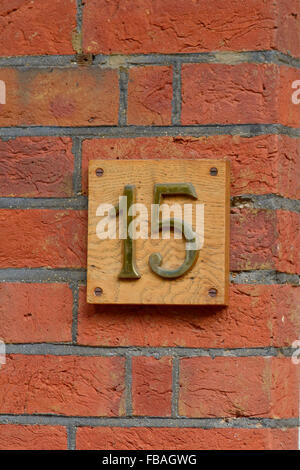 House number 15 sign on wall Stock Photo - Alamy