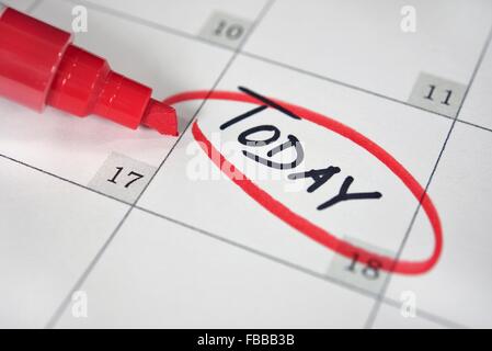 Calendar with red marker Stock Photo - Alamy