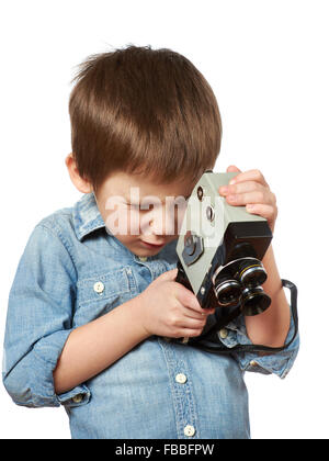 Young little boy kid filming video holding cinema director clapboard ...