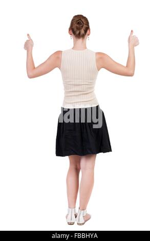 Back view of successful woman thumbs up Stock Photo - Alamy
