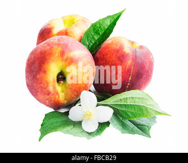 Whole and half fresh red peaches on wooden table Stock Photo - Alamy