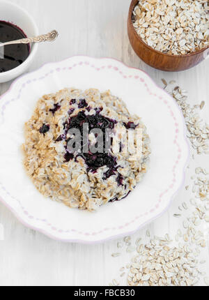 Oatmeal Porridge on a wooden table Stock Photo - Alamy
