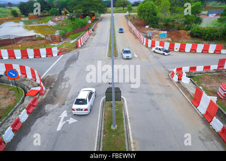 Road barriers erected along the work in progress construction area ...