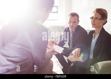 Conversation of colleagues Stock Photo - Alamy