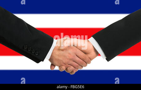 The Costa Rica flag and business handshake Stock Photo - Alamy