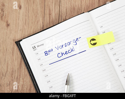 an open blank calendar with Post it stickers Stock Photo - Alamy