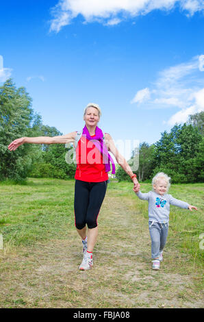 Happy family outdoor outing Stock Photo - Alamy