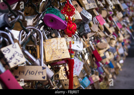 Wall of Love locks on Pont des arts bridge in Paris, selective focus ...
