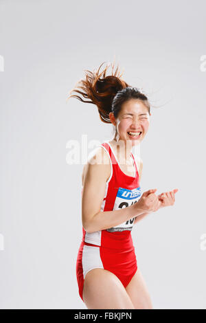 Japanese female high jump athlete Stock Photo - Alamy